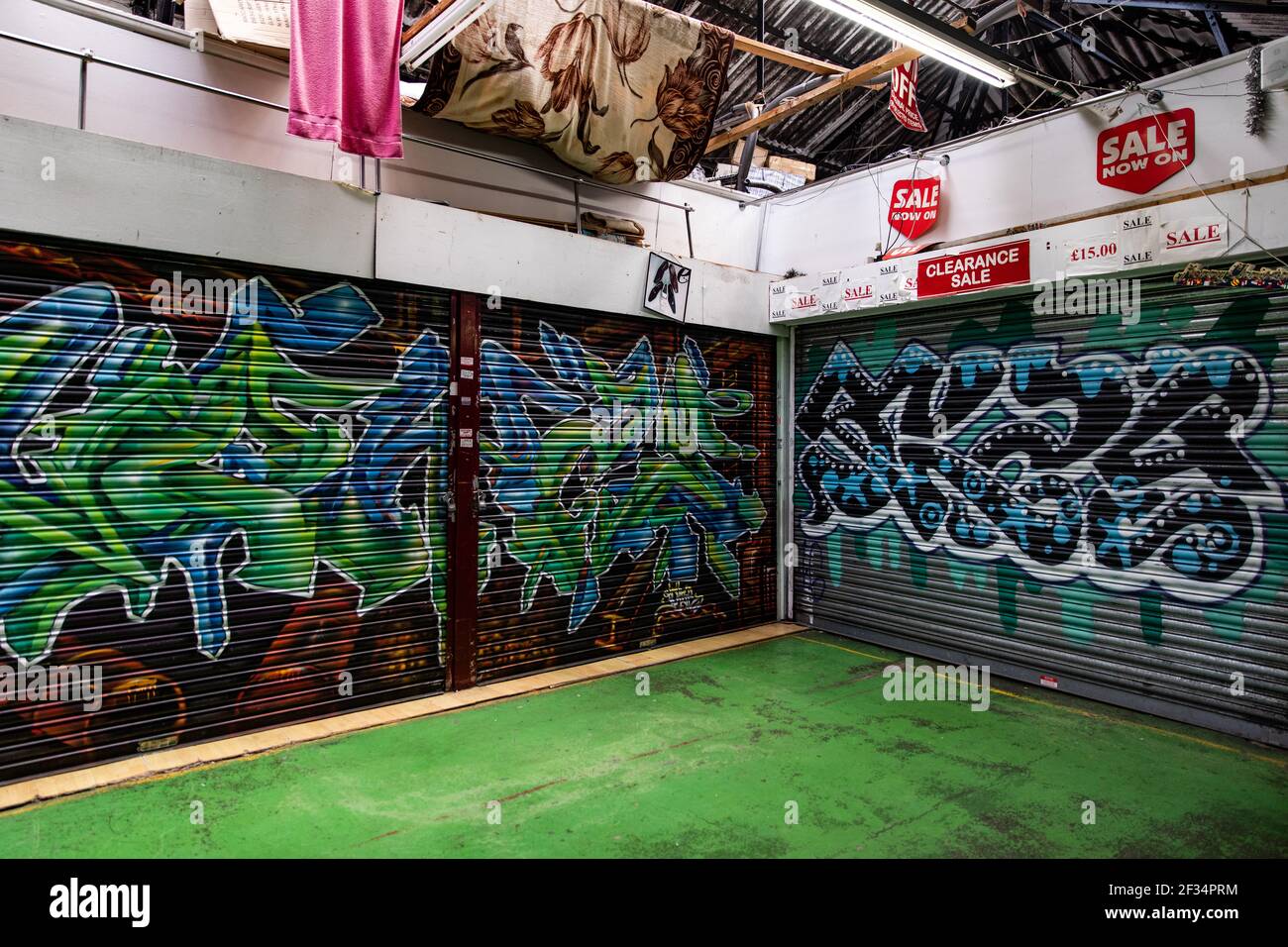 Graffiti painted closed store in Broadway Market in Tooting, South ...