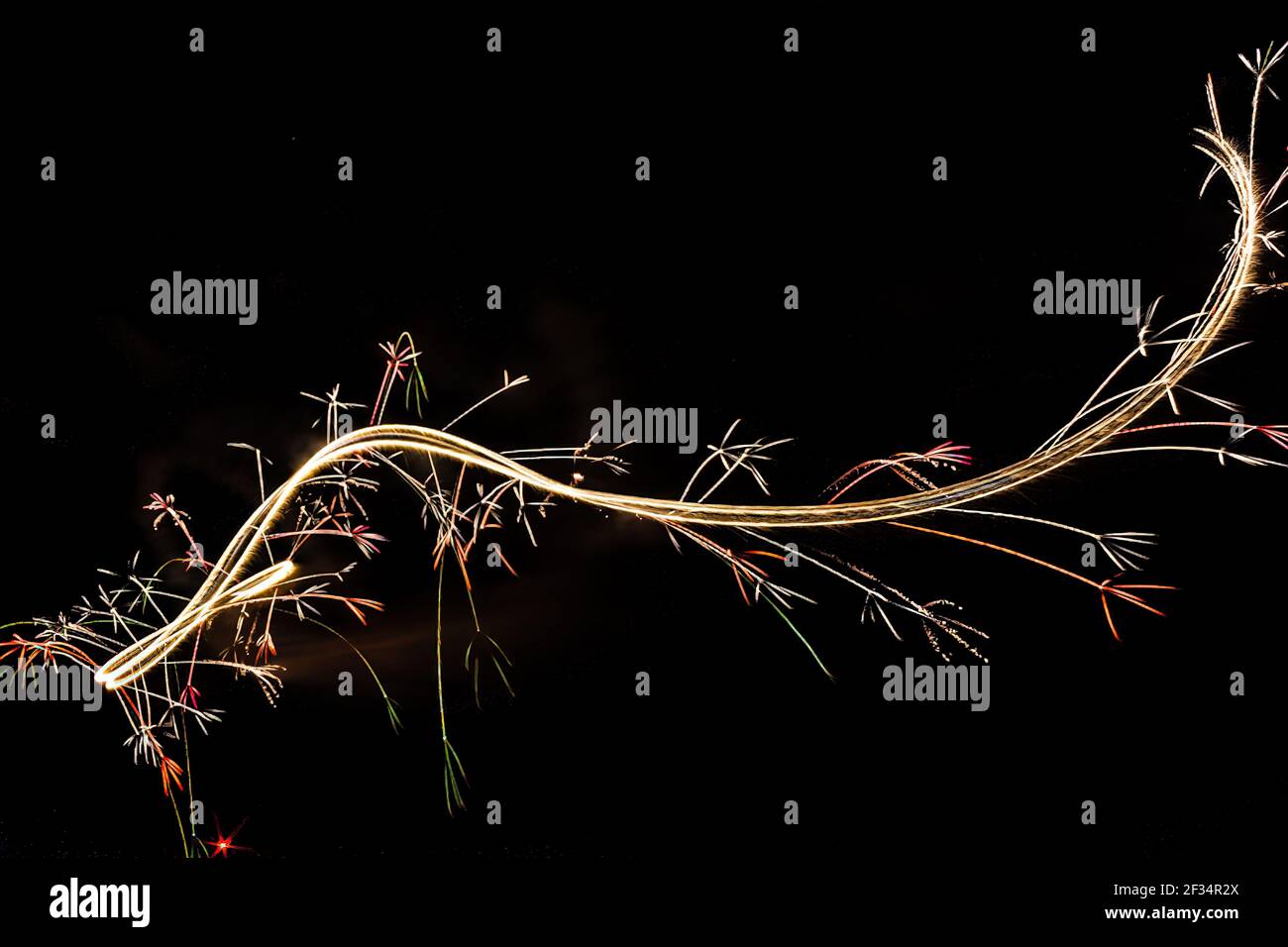 An ultralight aircraft performing a night show at the Sun N' Fun Flyin ...