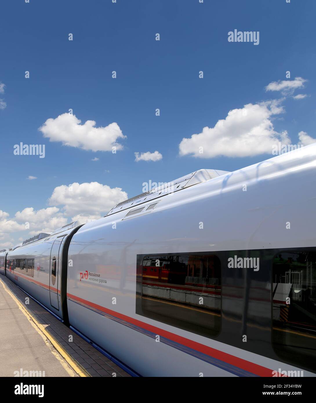 Aeroexpress Train Sapsan against the sky-- high-speed train acquired ...