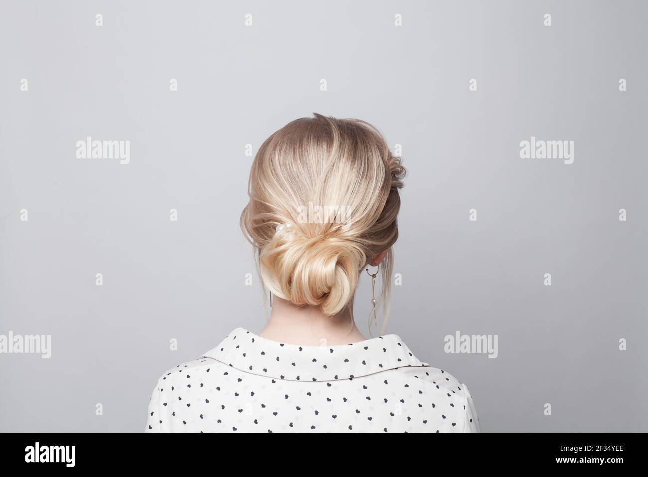 Beautiful fashionable hairstyle. Pretty woman back and head on white ...