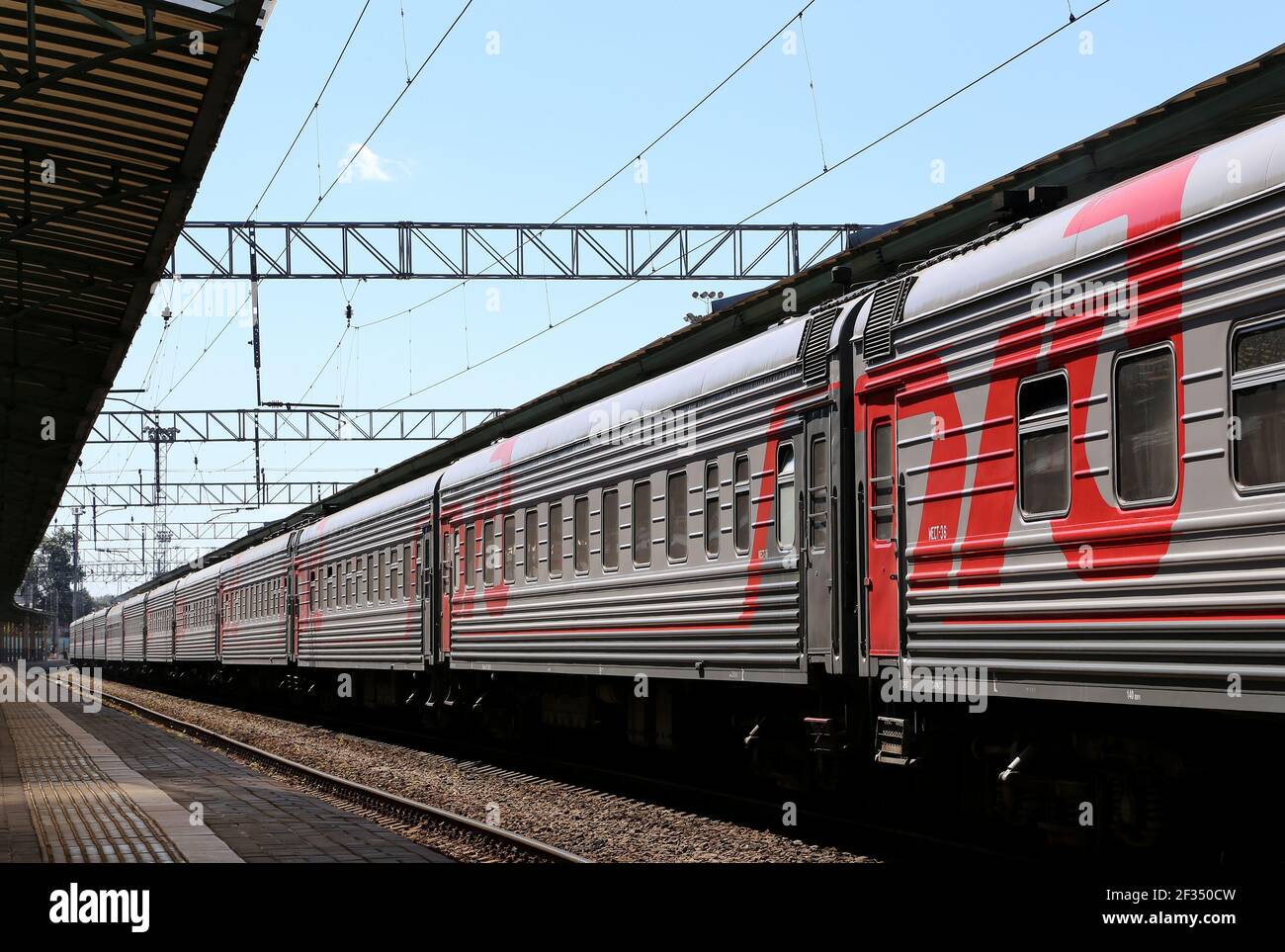 Train on Moscow passenger platform (Belorussky railway station) is one ...