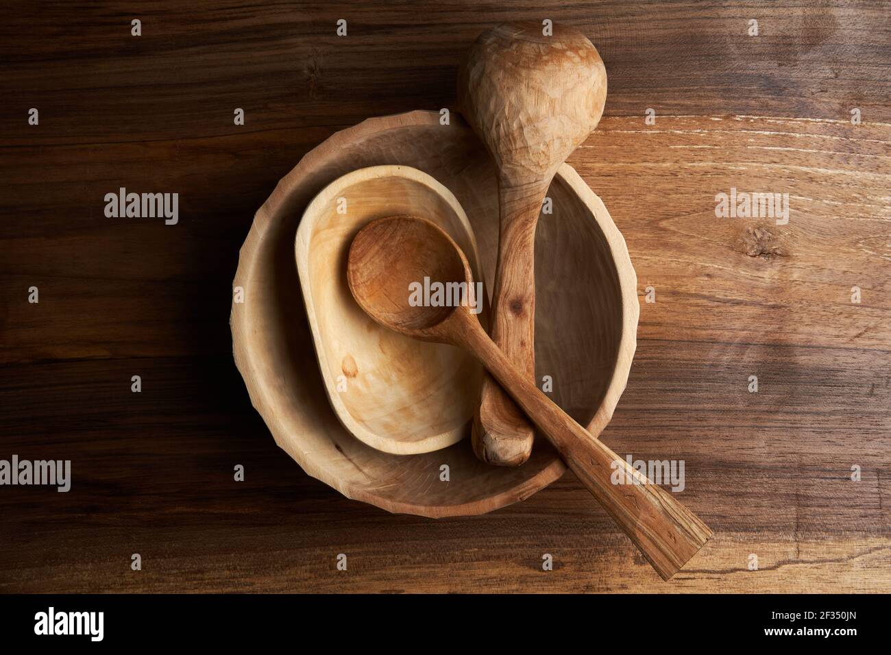 Tabletop image of wooden kitchen utensils on a walnut board Stock Photo ...