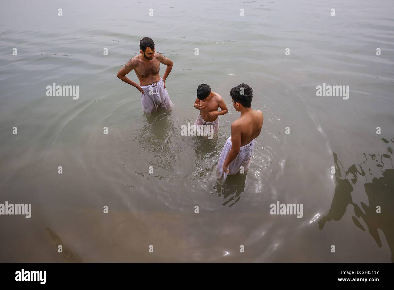 Baghdad, Iraq. 15th Mar, 2021. Members of the Mandaean community take ...