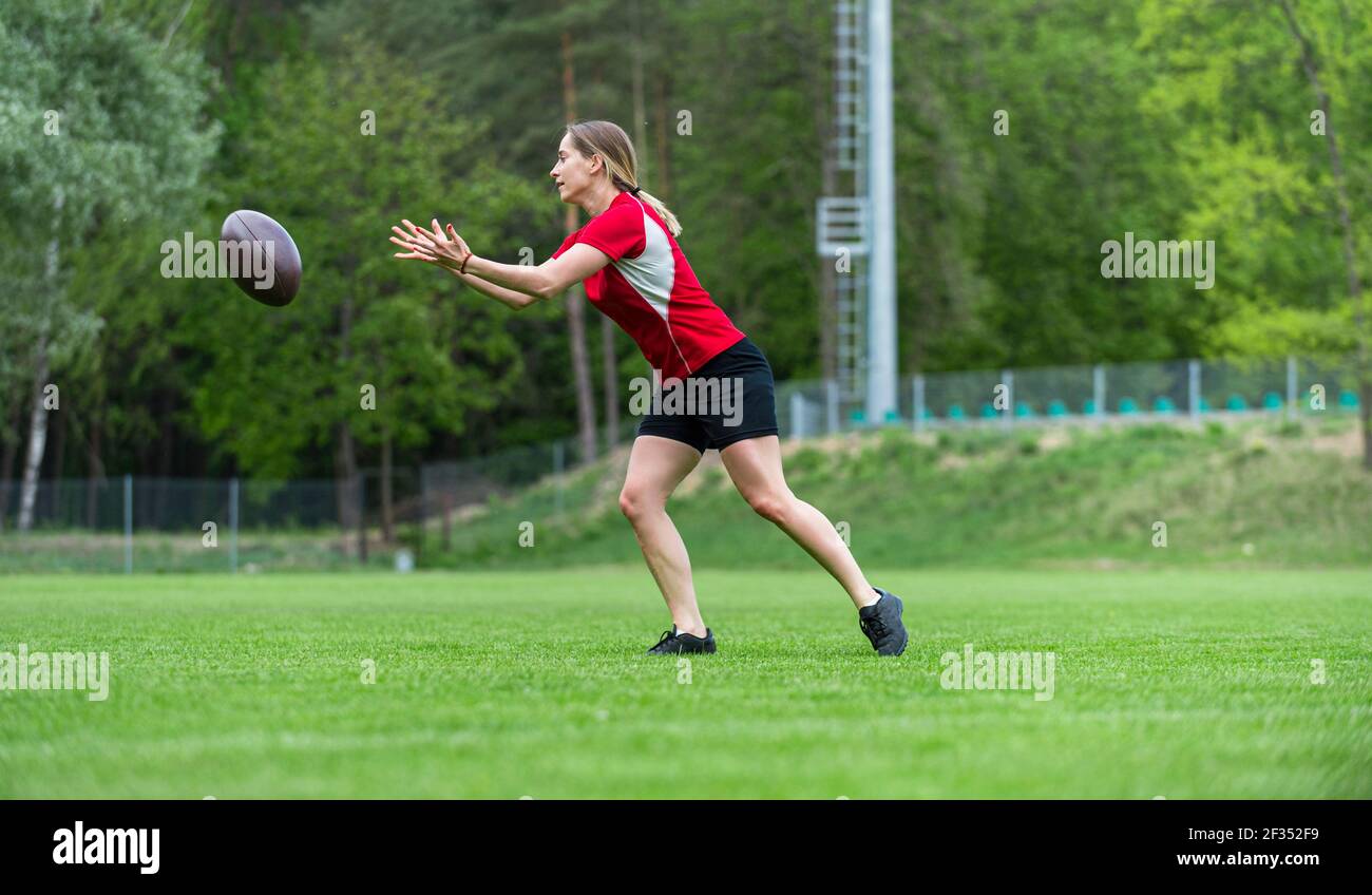 Girl playing rugby together outside in summer. Woman sport concept ...