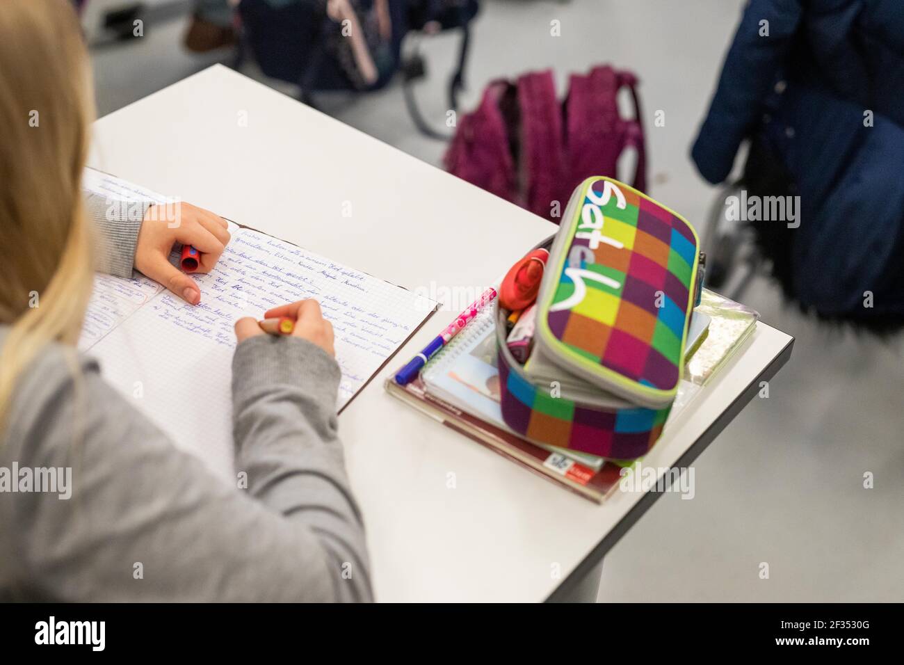 Heitersheim, Germany. 15th Mar, 2021. A student in a fifth grade class ...