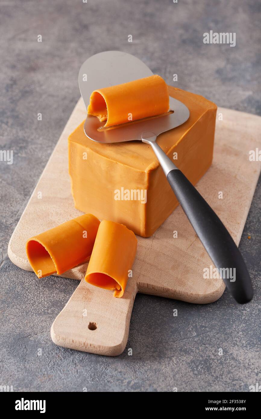Norwegian brunost traditional brown cheese Stock Photo - Alamy