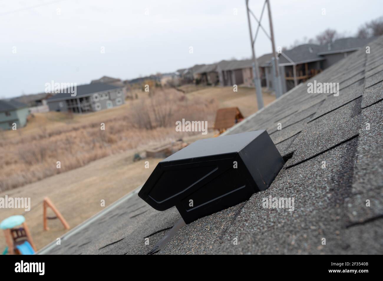 typical static passive vent installation on a residential roof Stock ...