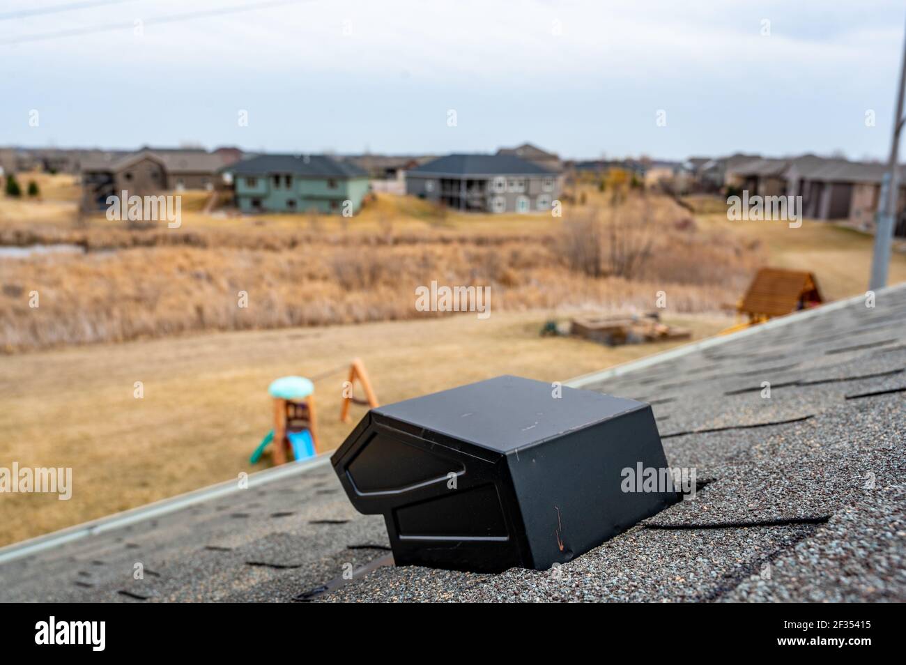 typical static passive vent installation on a residential roof Stock ...