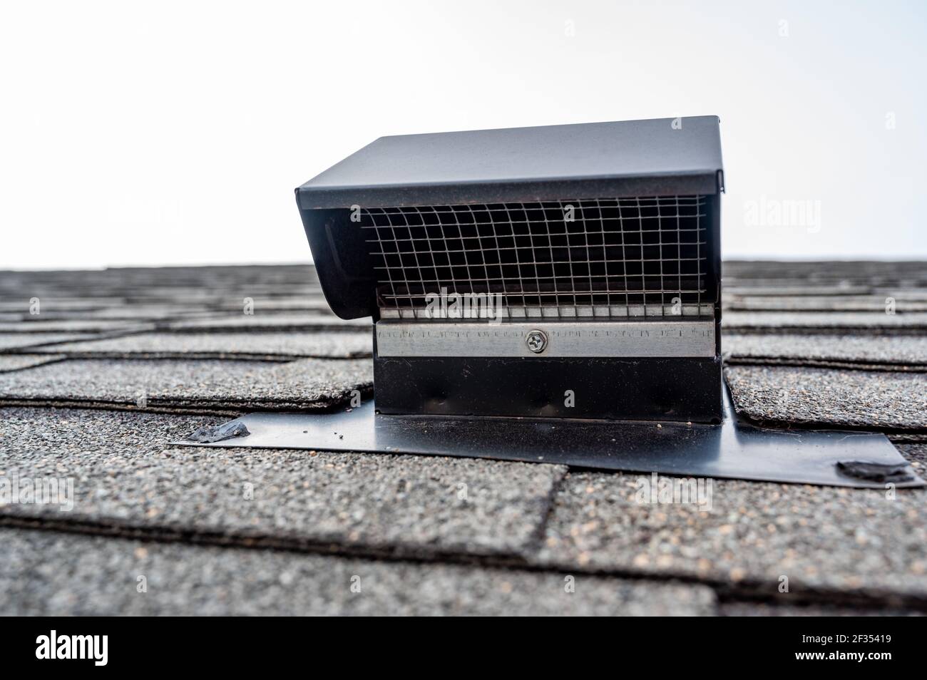 typical static passive vent installation on a residential roof Stock ...