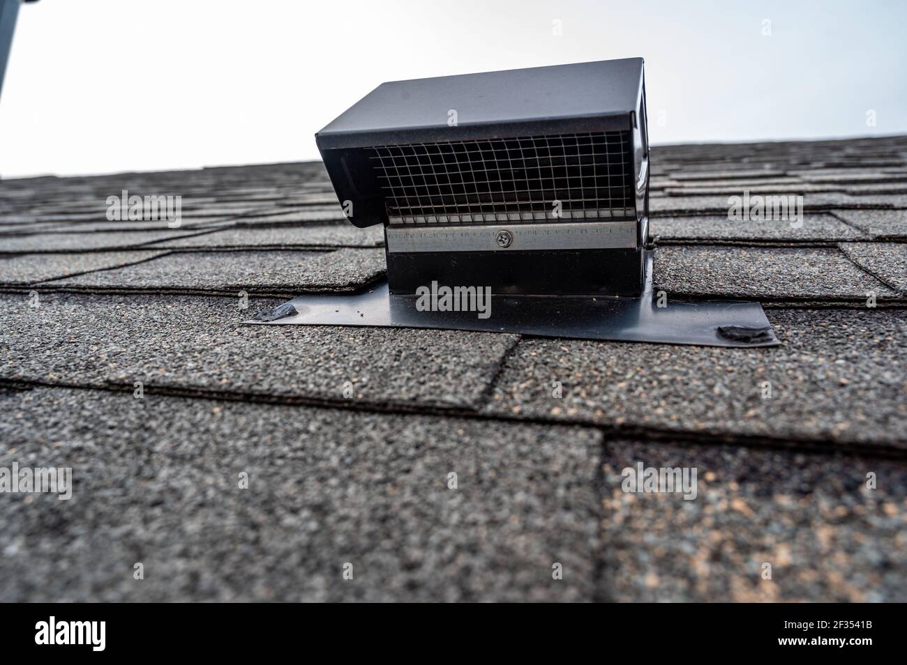 typical static passive vent installation on a residential roof Stock ...