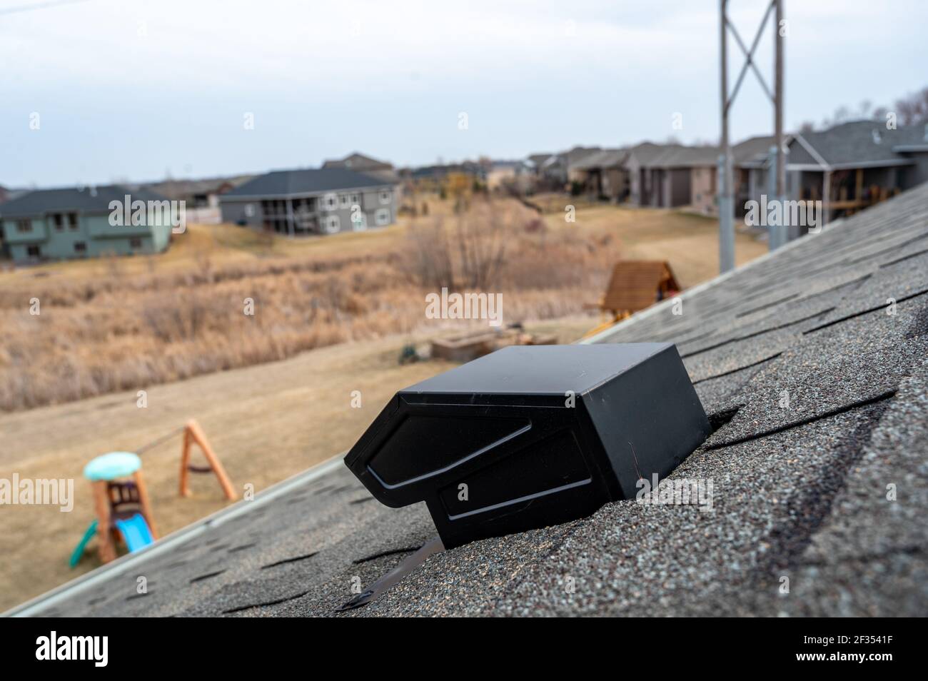 typical static passive vent installation on a residential roof Stock ...