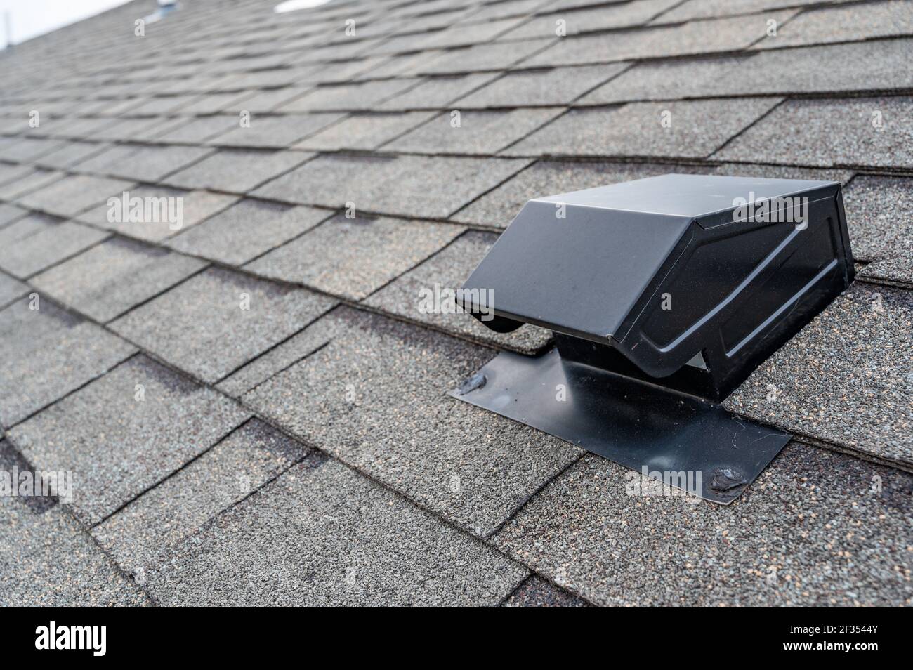 typical static passive vent installation on a residential roof Stock ...