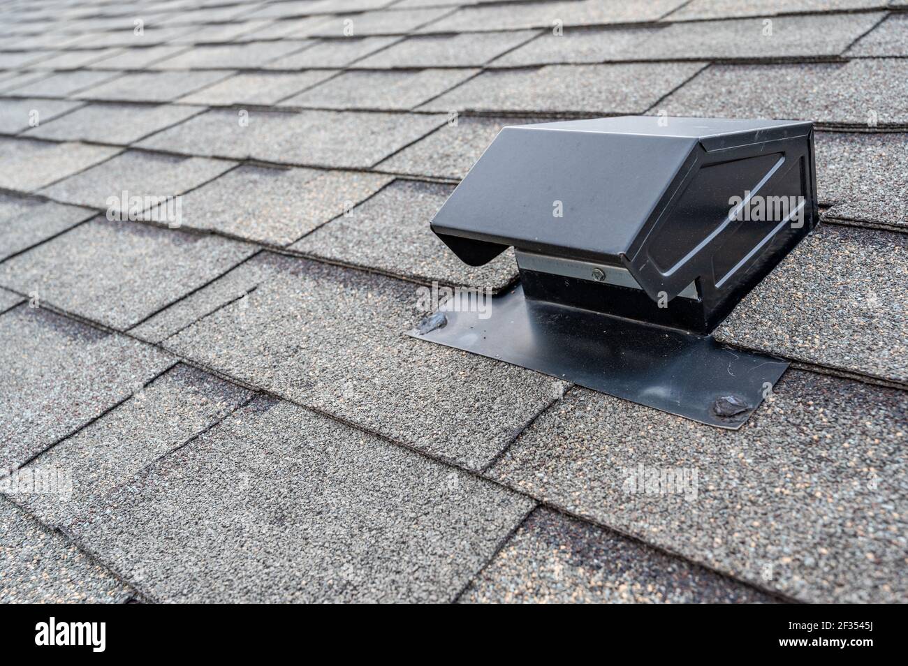 typical static passive vent installation on a residential roof Stock ...