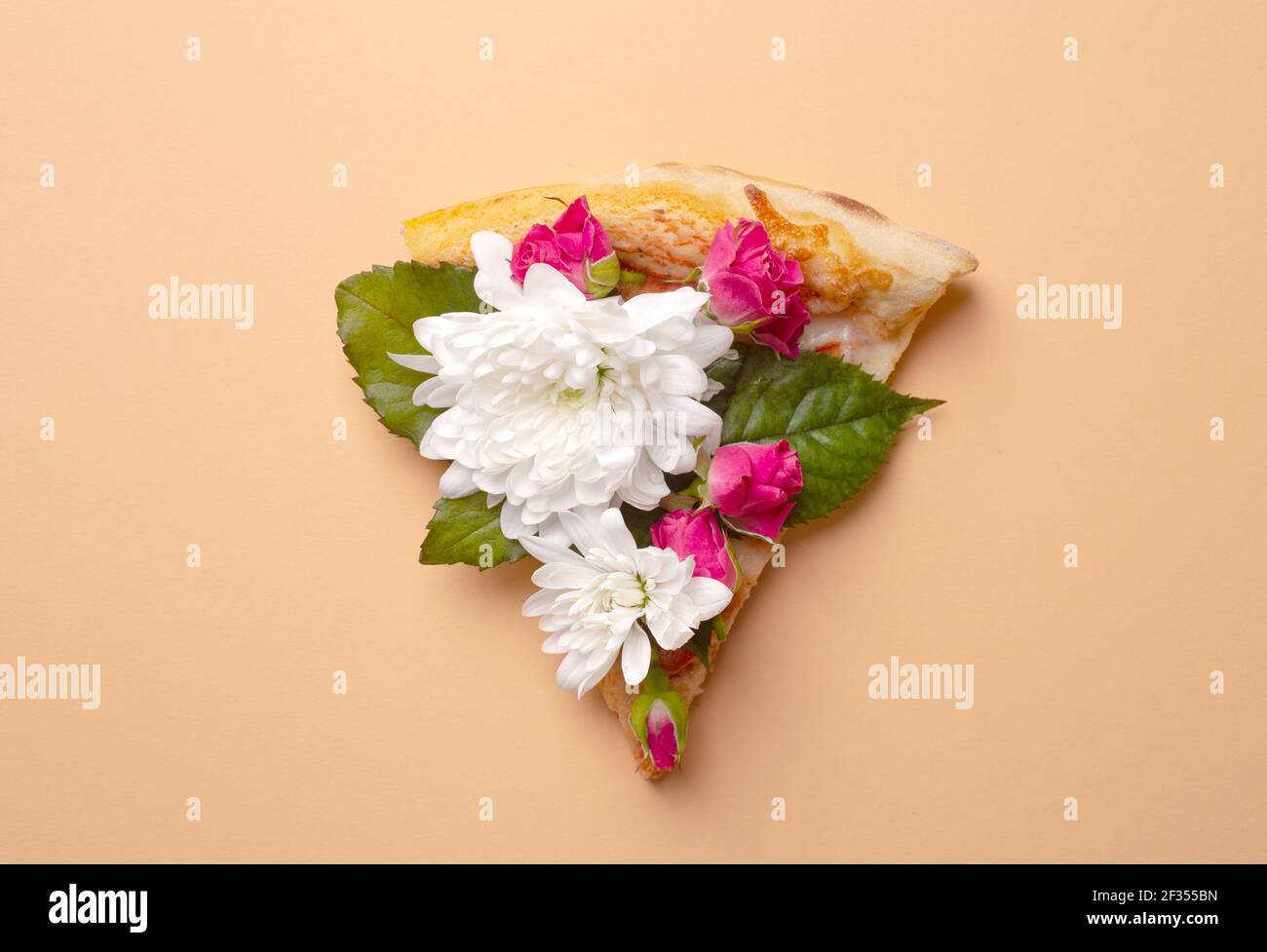 Spring floral concept with pizza and flowers Stock Photo - Alamy