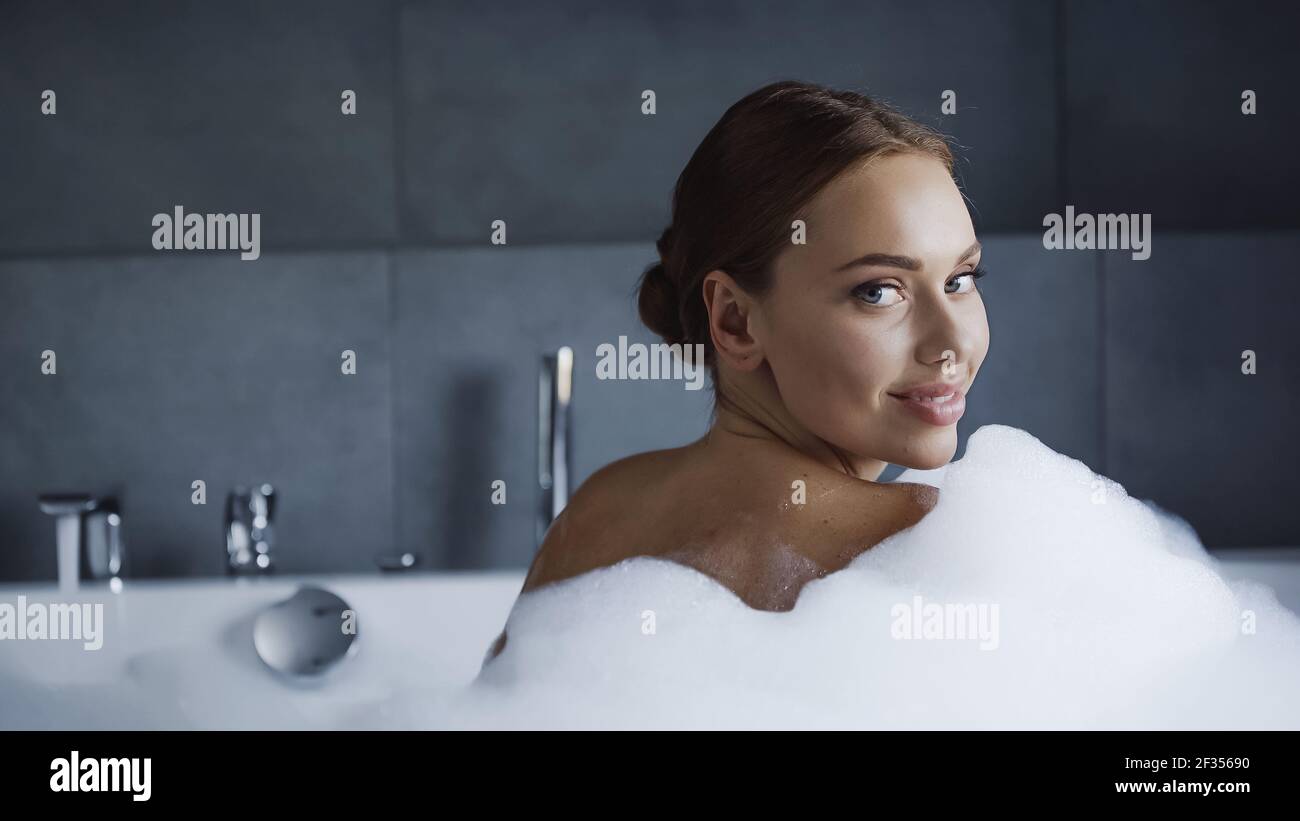 Woman wash bathtub hi-res stock photography and images - Alamy