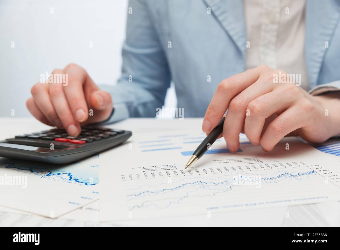 Business manager with calculator hi-res stock photography and images ...