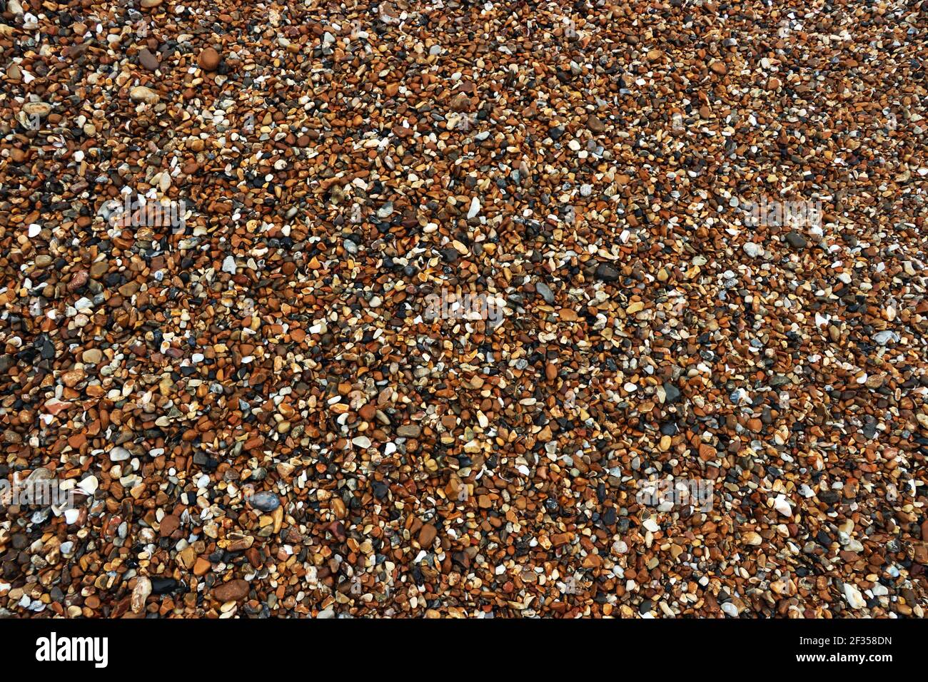 Abstract pebble or shingle background Stock Photo - Alamy