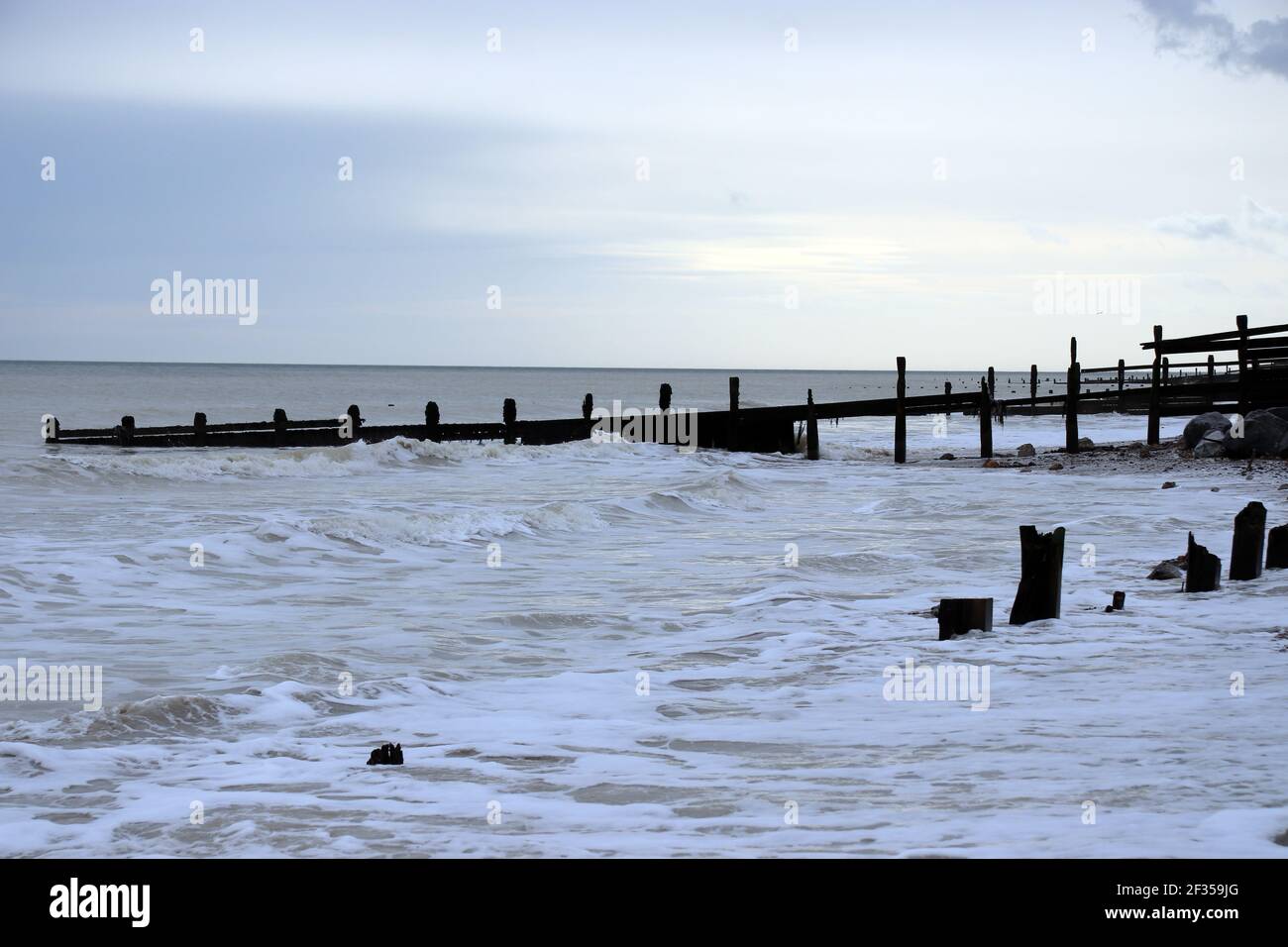 Groynes ocean orange hi-res stock photography and images - Alamy
