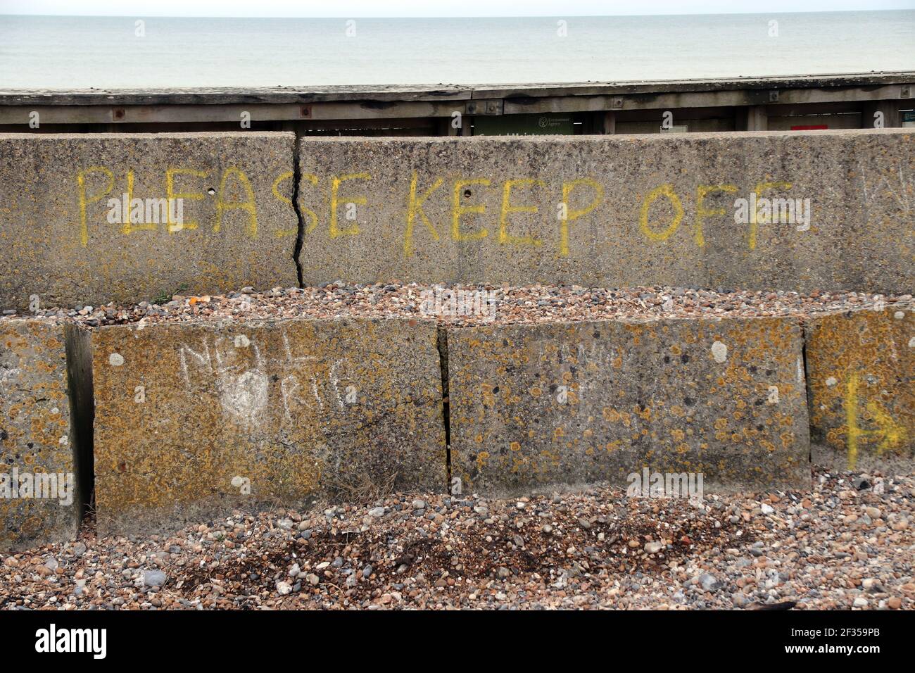 Please keep off writen in spray paint Stock Photo - Alamy