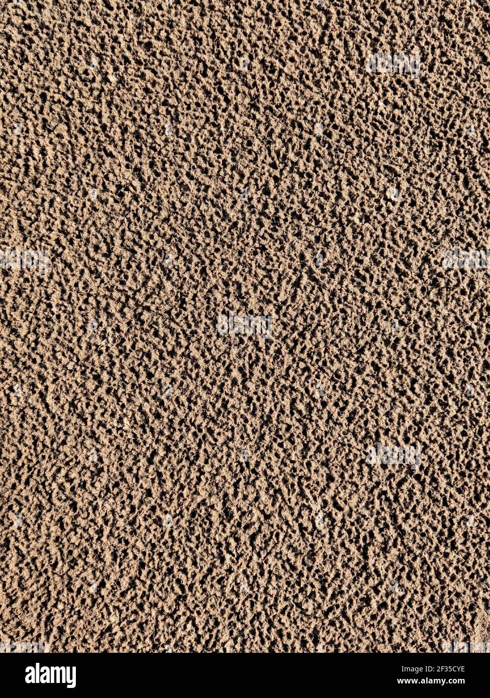A rough concrete light brown texture for wallpaper or background Stock ...
