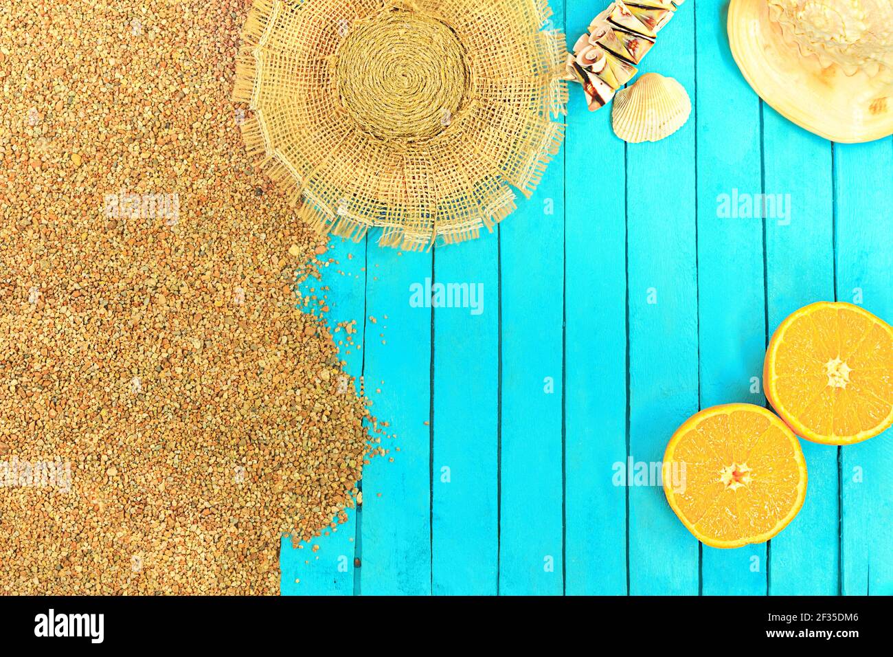 Beach layout. Pebbled sand with an azure wooden pier or sun lounger ...