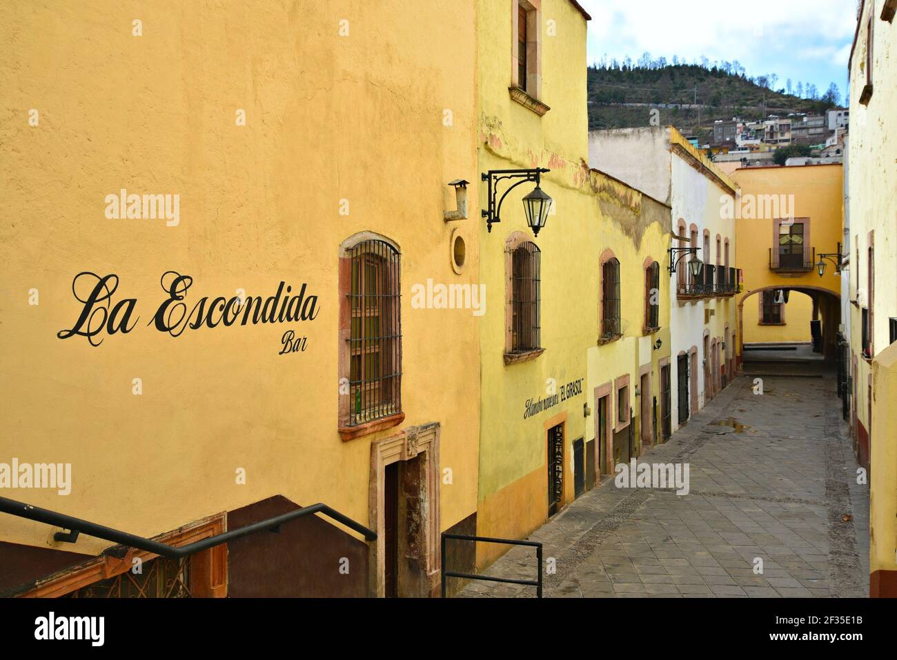 Scenic view of Colonial commercial buildings with ochre stucco walls ...