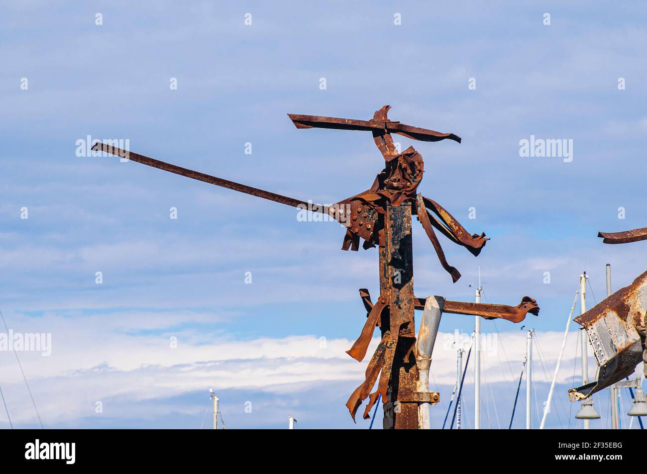 Old, rusted and decaying metal pylon from a demolished warehouse ...