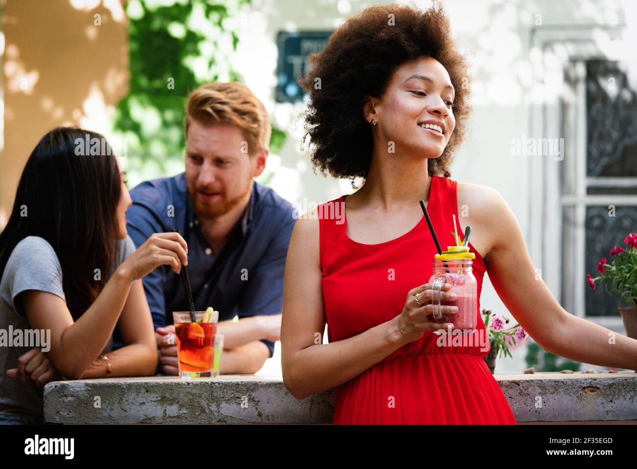 Group of friends having fun together. People talking laughing and ...