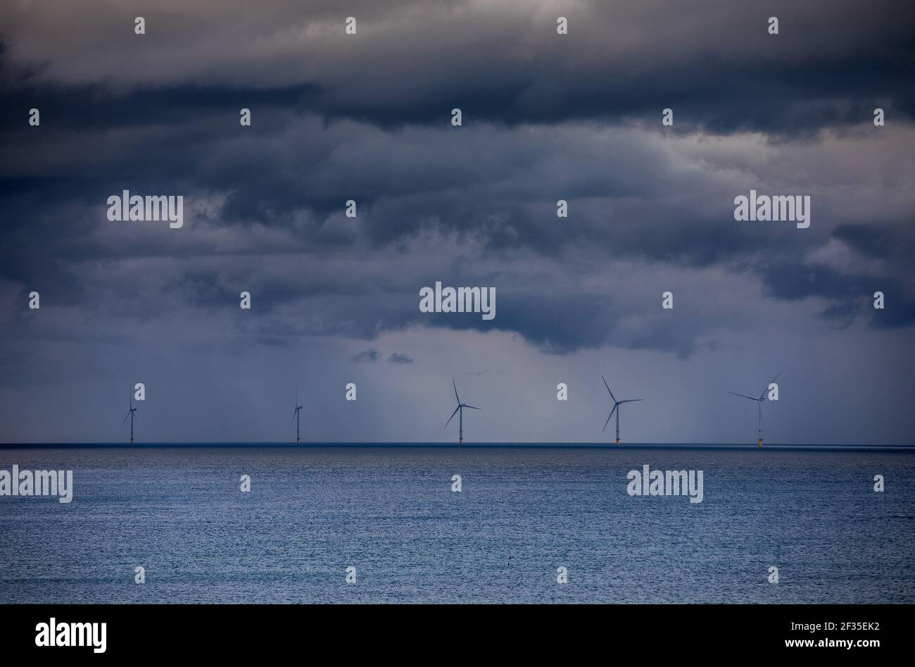 Wind farm out on the North Sea seen from Tynemouth Longsands in North ...