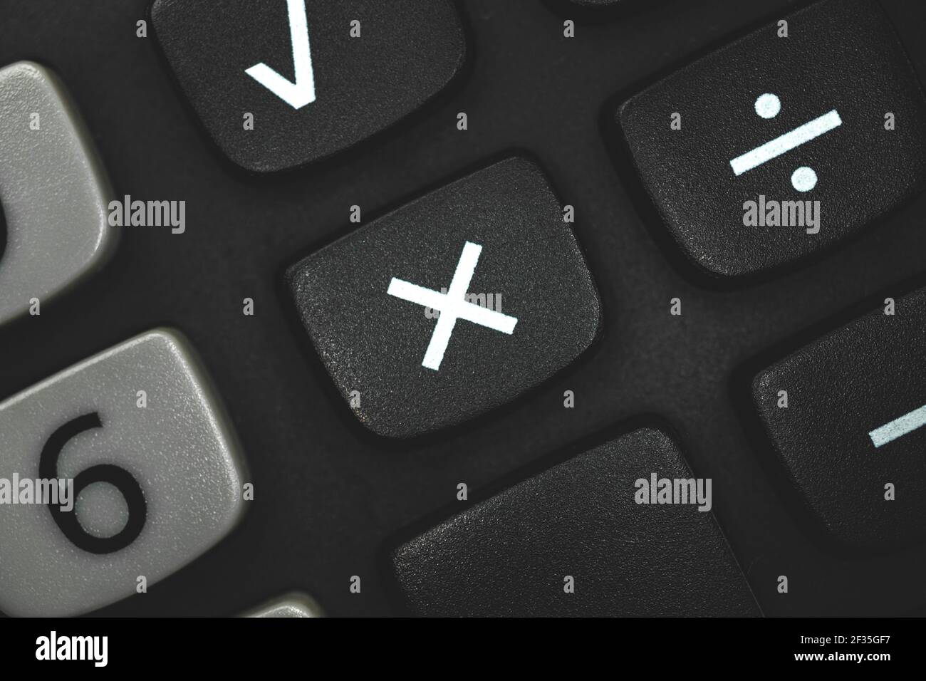 Multiply button with sign amd symbol close up, calculator close-up ...