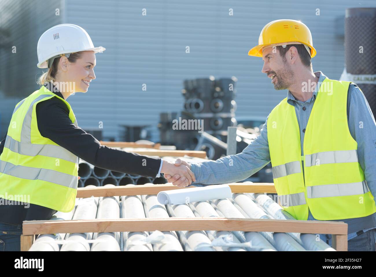 Industrial worker and coat and hat hi-res stock photography and images ...
