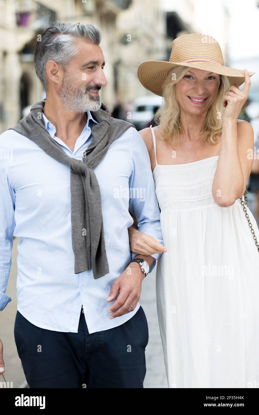happy romantic couple walking outdoors in the city Stock Photo - Alamy