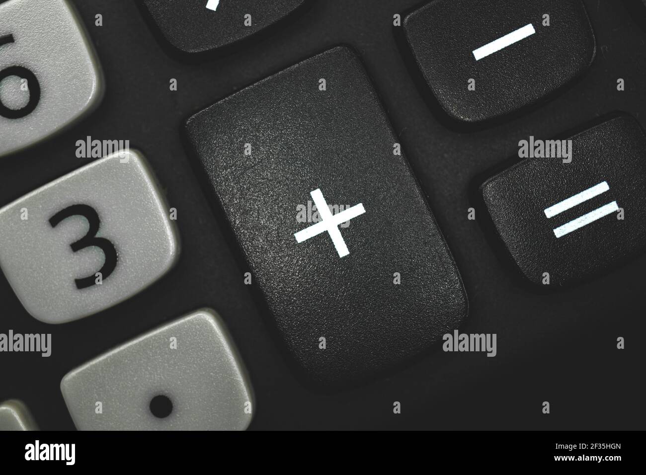 Plus sign and symbol, calculator button close-up photo Stock Photo - Alamy