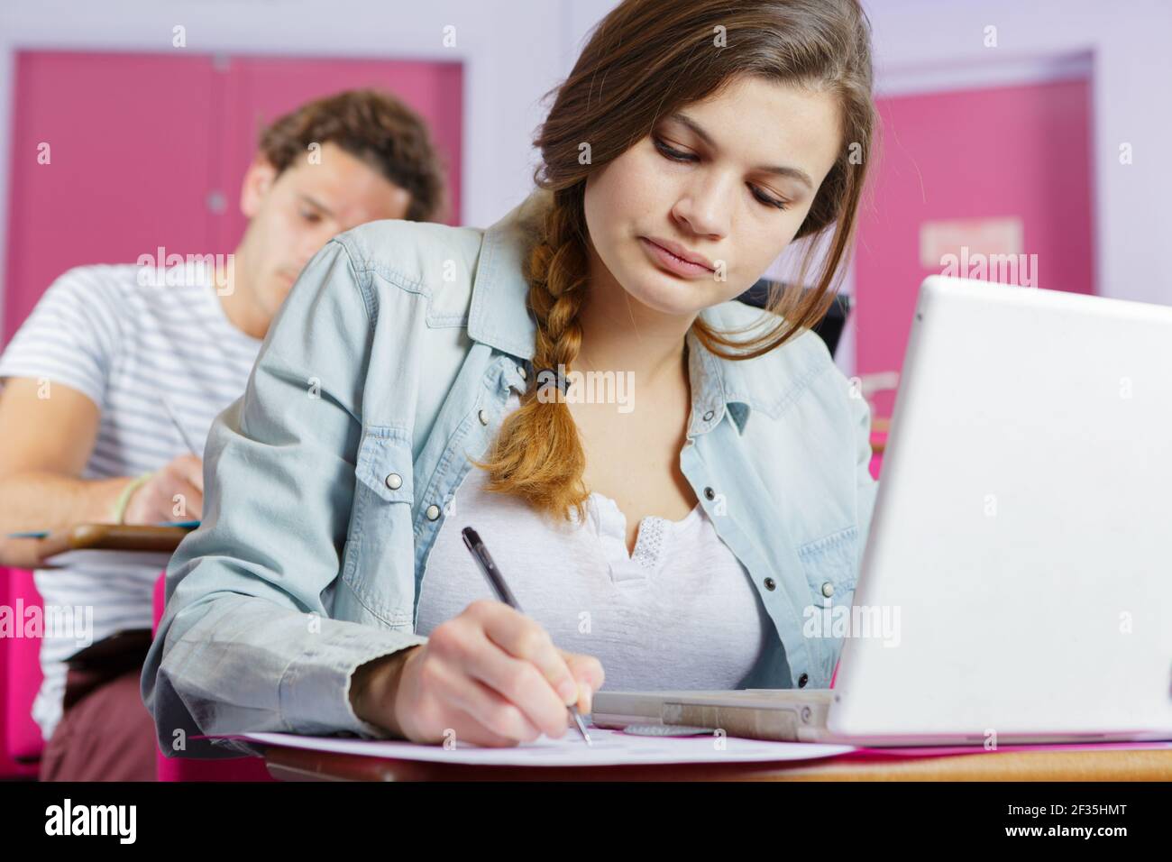 college student studying in classroom Stock Photo - Alamy