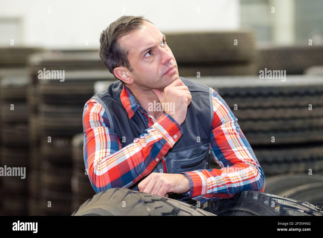 auto mechanic thinking in his workshop Stock Photo - Alamy