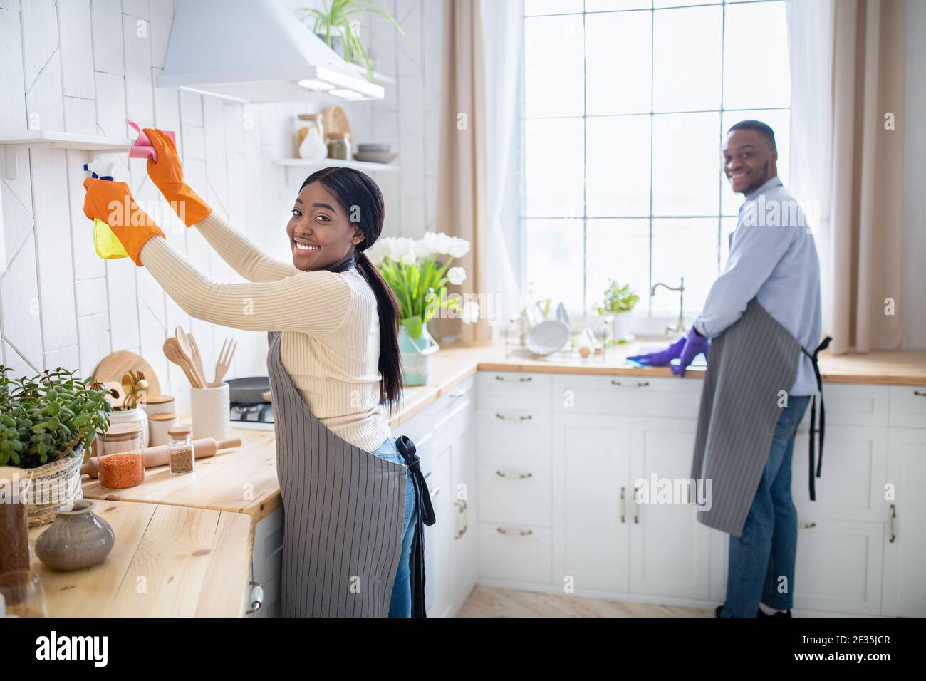 Cleaning together family hi-res stock photography and images - Alamy
