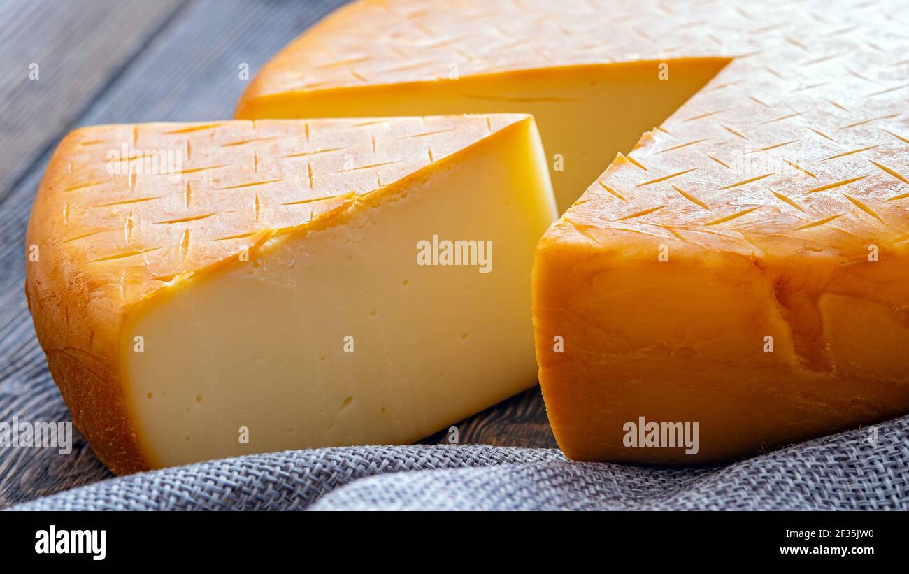 Abstract banner with a cheese head, with a cut-out piece for conceptual ...