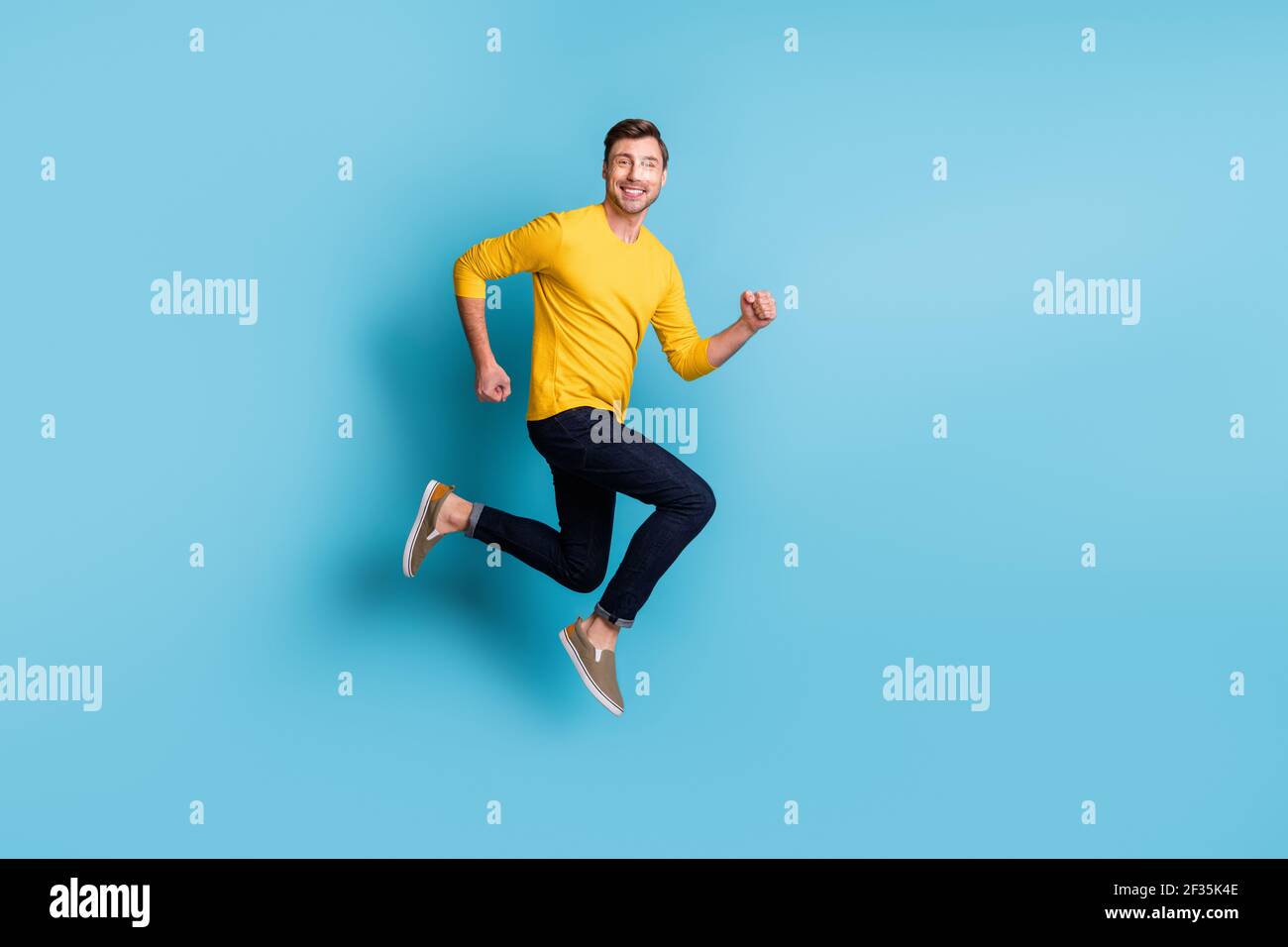 Full body profile photo of satisfied person running jumping toothy ...