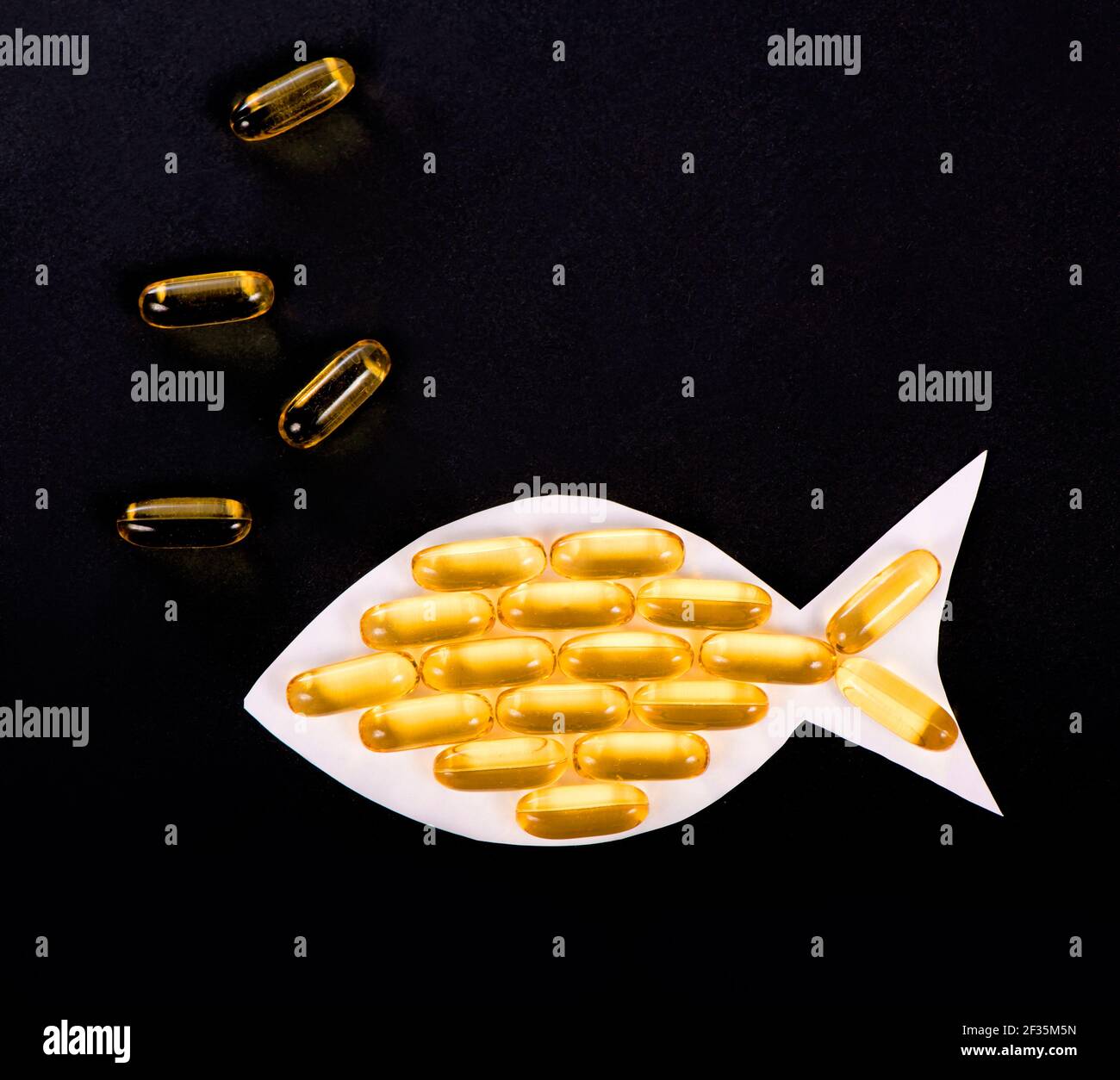 Fish shape Cod Liver Oil Capsules, Omega 3, Vitamin D Stock Photo - Alamy