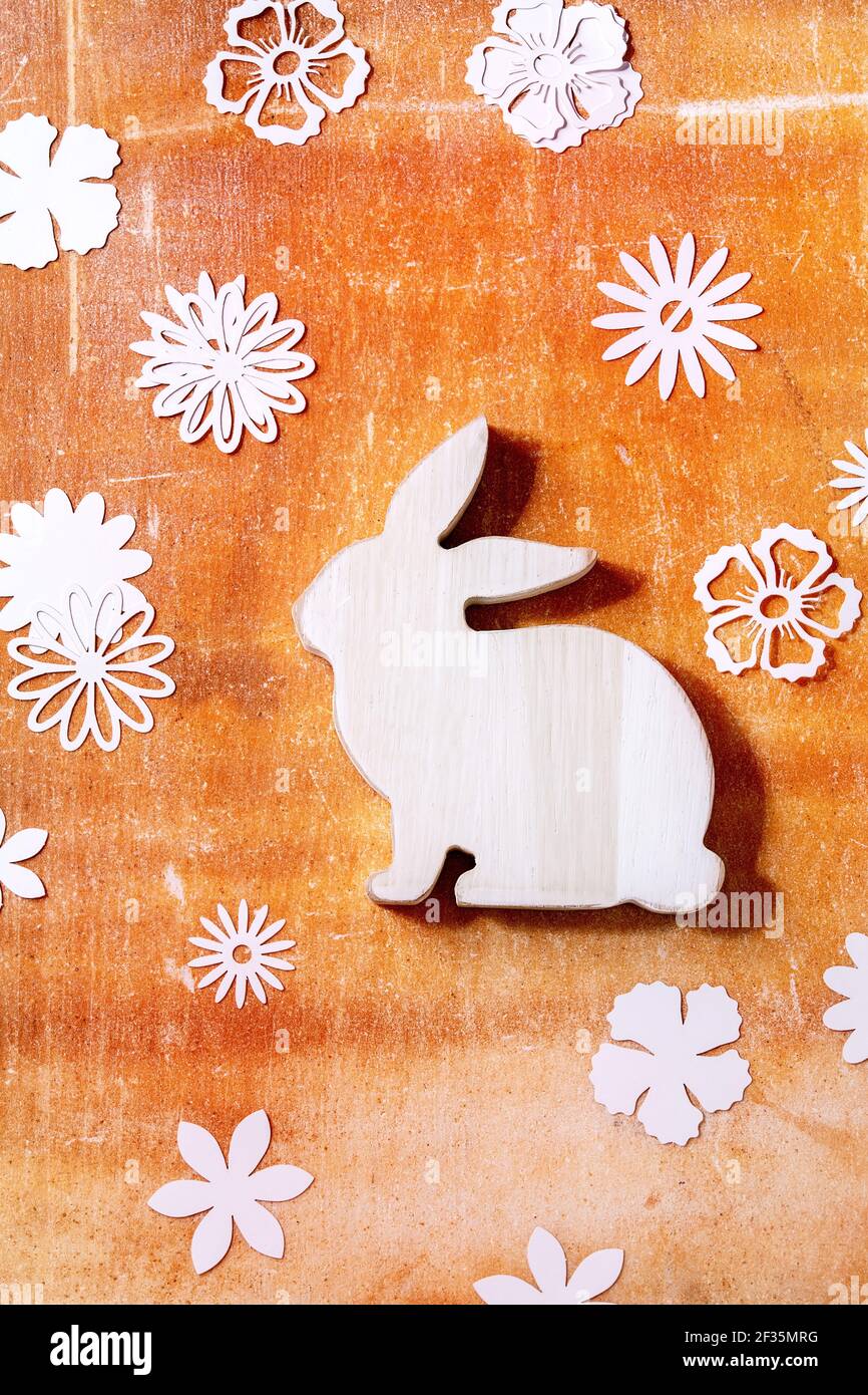 Easter bunny rabbit with paper flowers around Stock Photo - Alamy