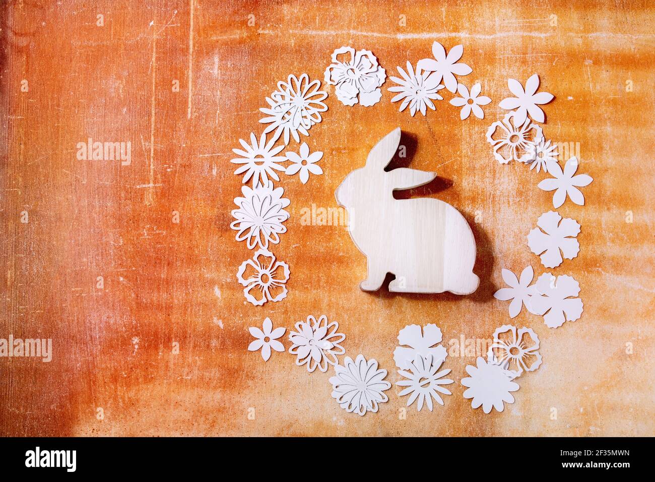 Easter bunny rabbit with paper flowers around Stock Photo - Alamy