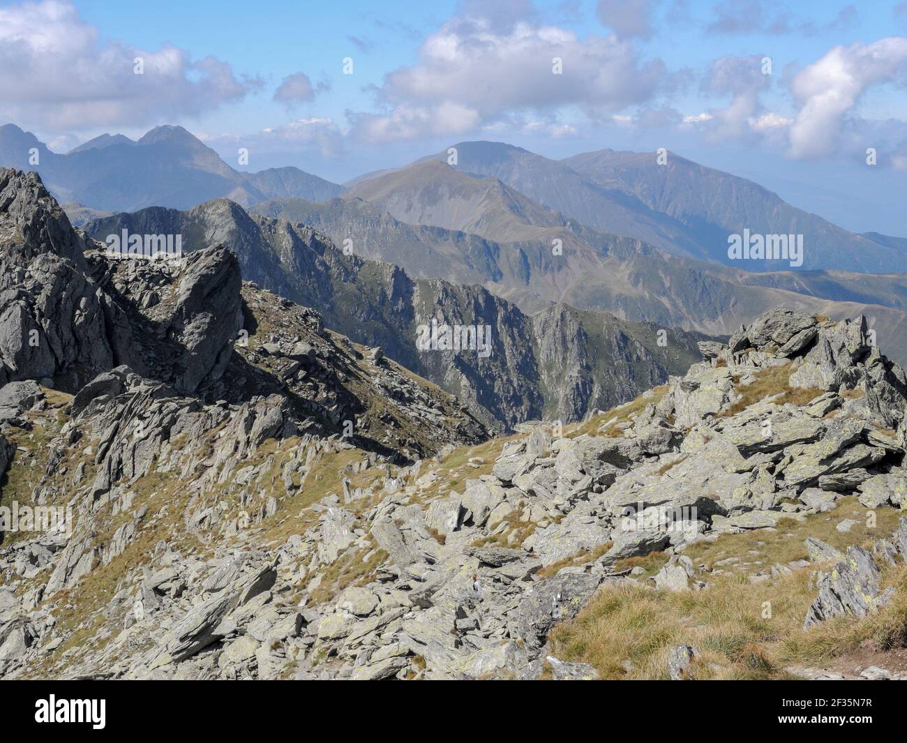 A mesmerizing view of Fagaras mountains under a cloudy sky in Romania ...