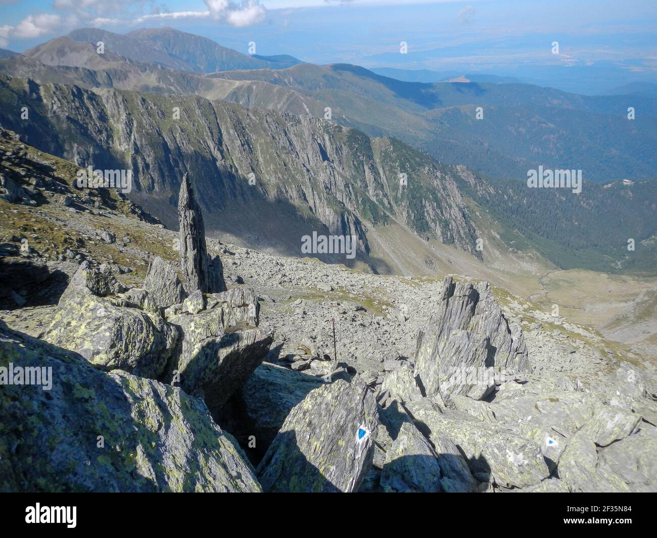 A mesmerizing view of Fagaras mountains under a cloudy sky in Romania ...