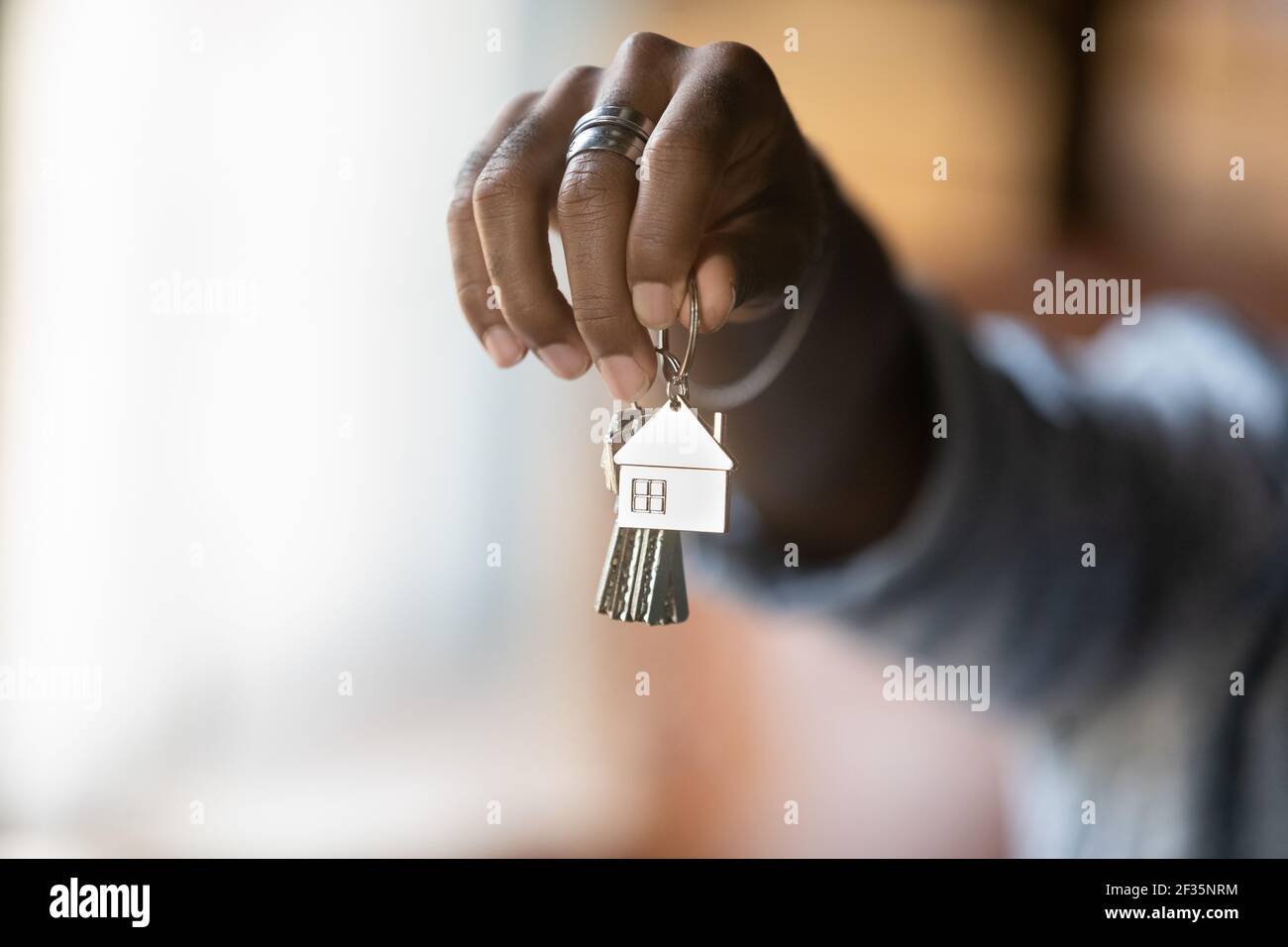 Hand holding bunch keys hi-res stock photography and images - Alamy