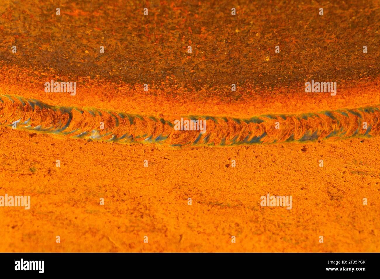 the weld seam is rusted on the metal structure Stock Photo - Alamy