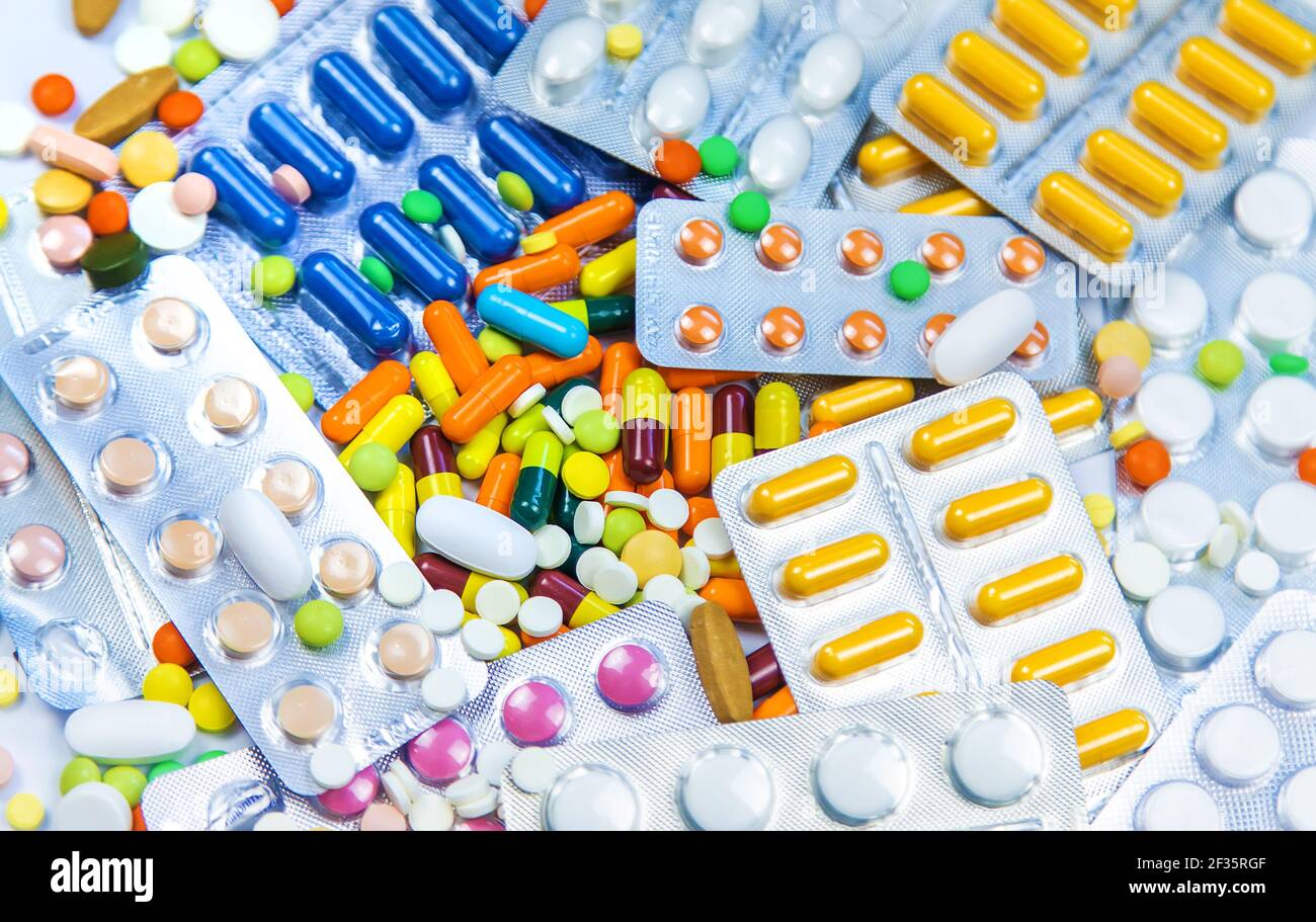 Many different pills and capsules. Selective focus. medicine Stock ...