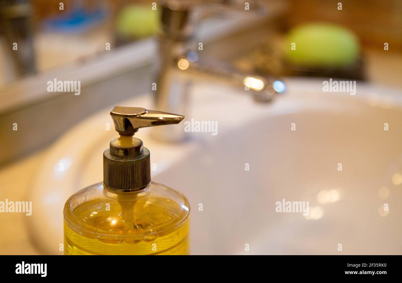 yellow liquid soap and green soap near the sink 2021 Stock Photo - Alamy