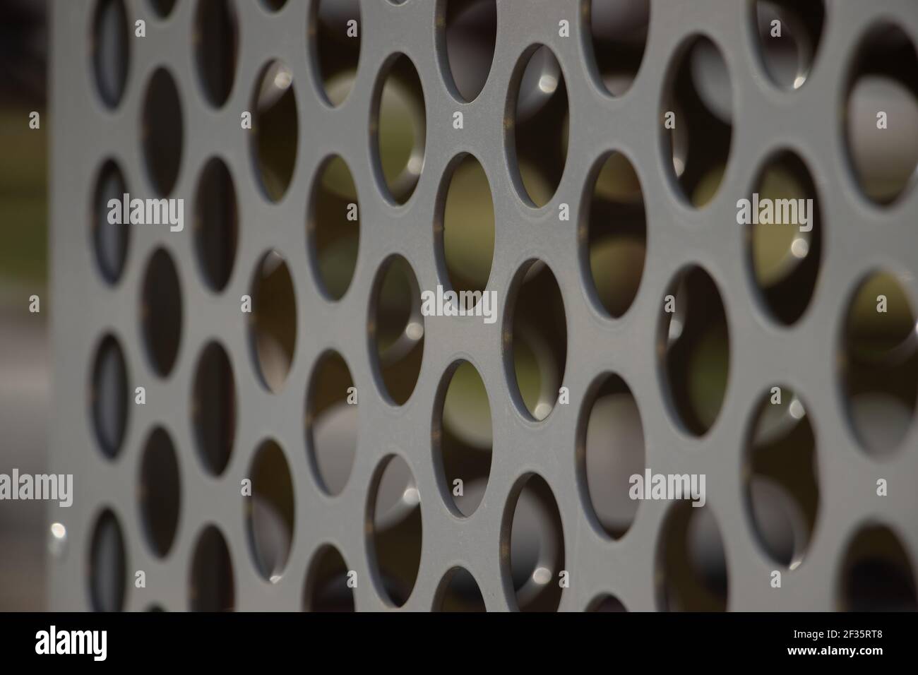 A circle patterned steel fence Stock Photo - Alamy