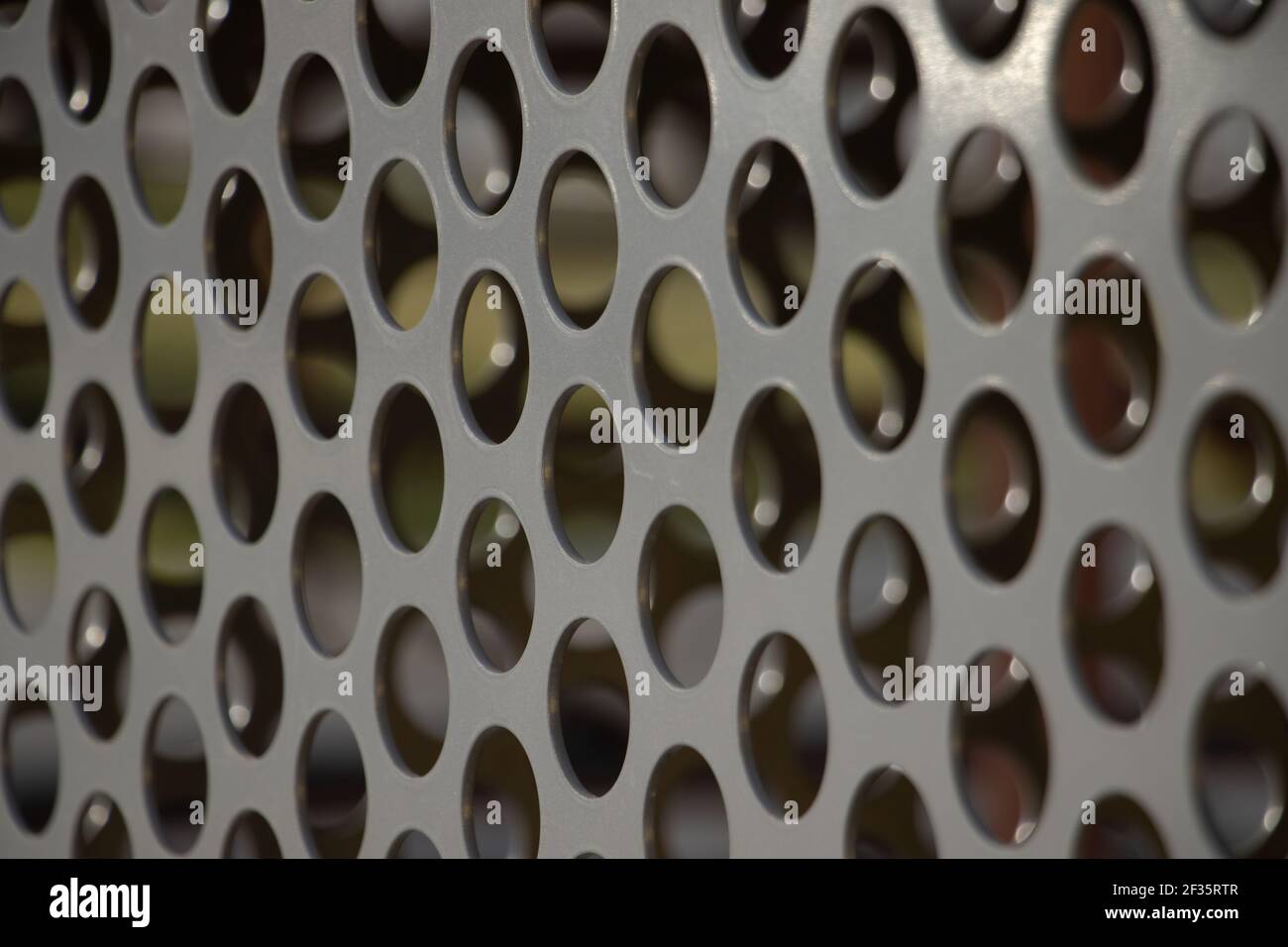 A circle patterned steel fence Stock Photo - Alamy