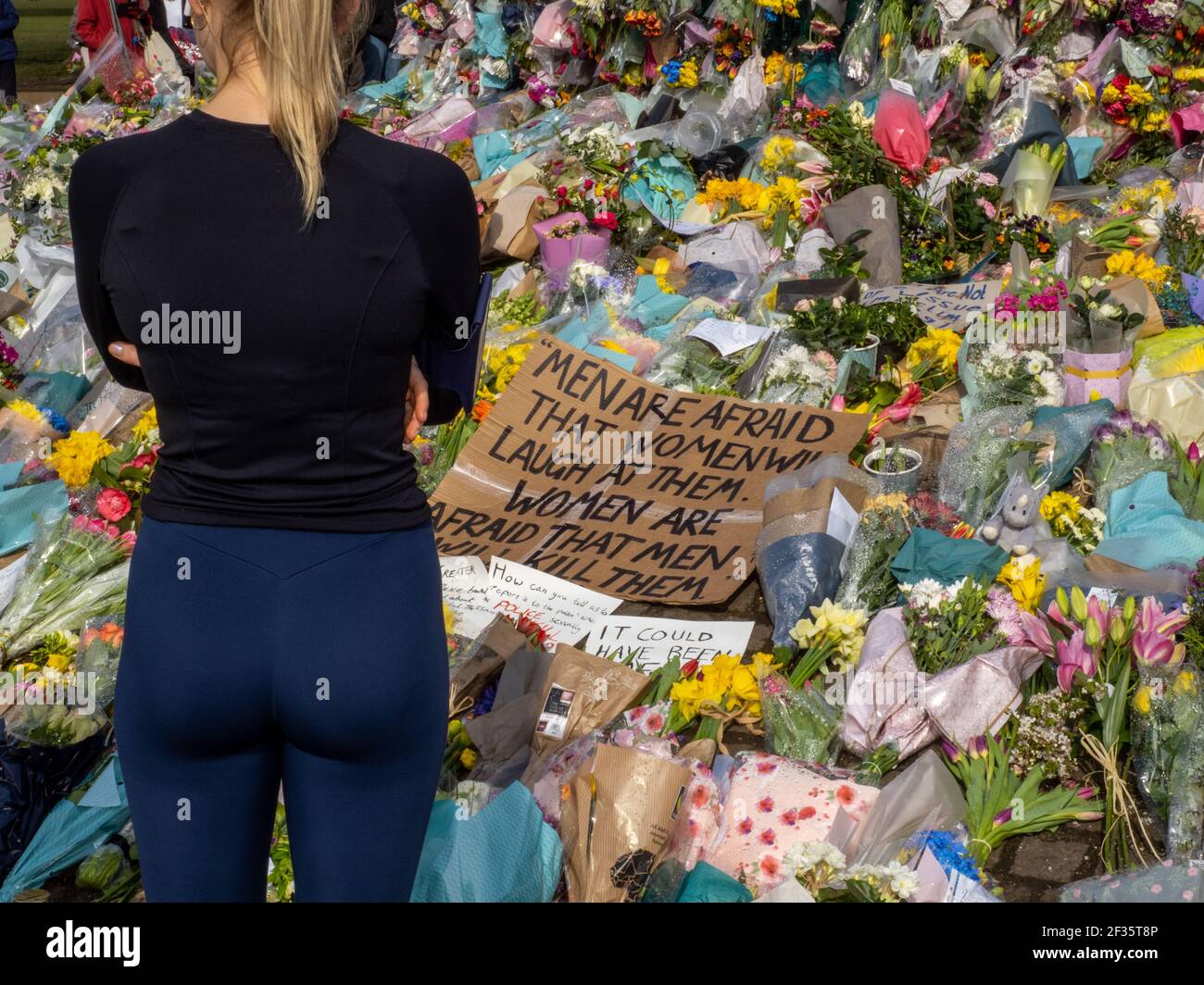 A visitor to the makeshift shrine to the murdered woman Sarah Everard ...
